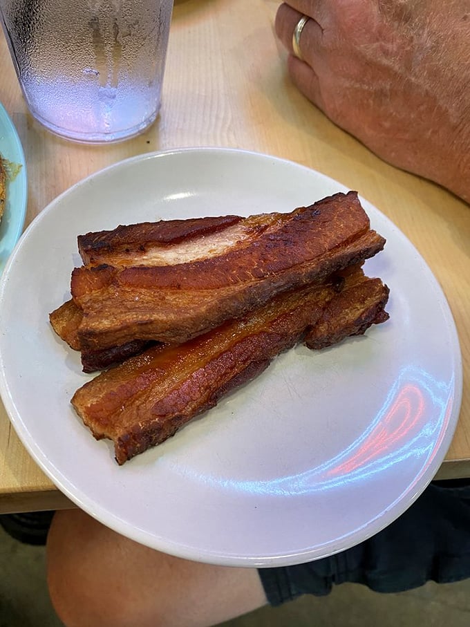 Bacon so perfectly rendered it should have its own art exhibition. Crispy, meaty, and unapologetically indulgent—breakfast's ultimate sidekick.