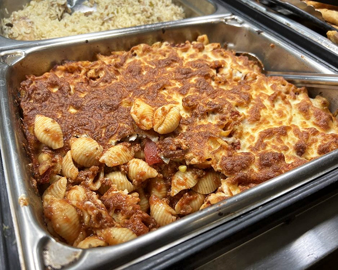 This baked pasta casserole has achieved what politicians can't – bringing different elements together in perfect, cheesy harmony.