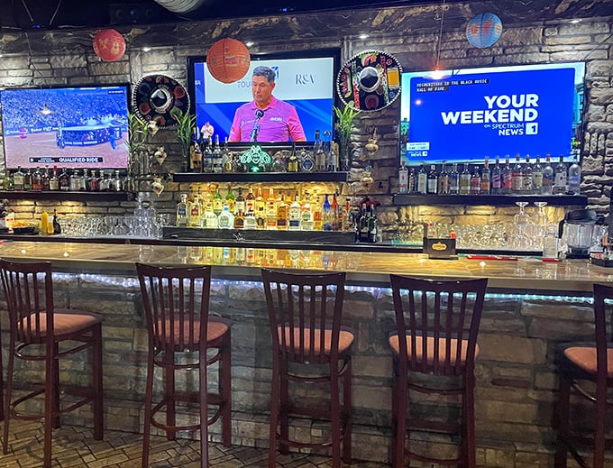 The bar area strikes that perfect balance between "watching the game" and "having a conversation that doesn't require shouting."