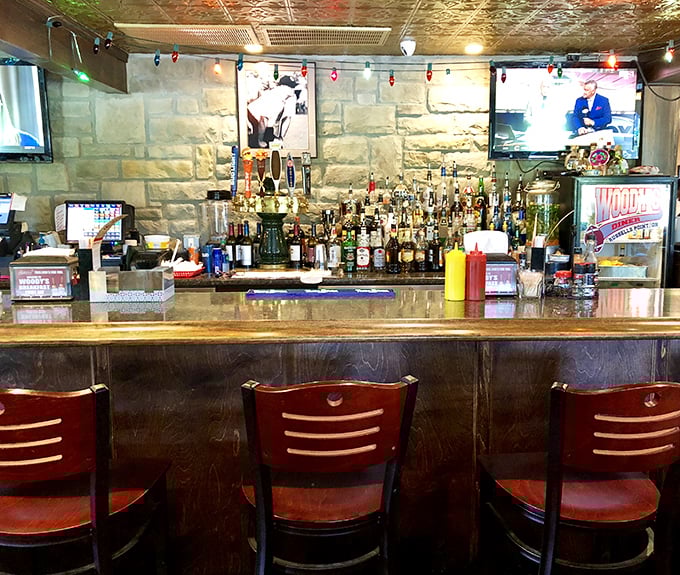 The bar at Woody's isn't just where drinks are served—it's command central for community connection and sports debate.