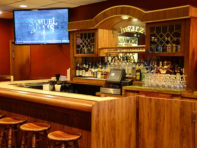 The bar at Schwarz's isn't just where drinks are served—it's where strangers become friends and friends become family.