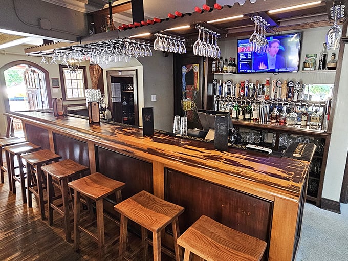 The bar beckons with the promise of perfectly poured German beers and spirits – a wooden altar to Bavarian brewing traditions.