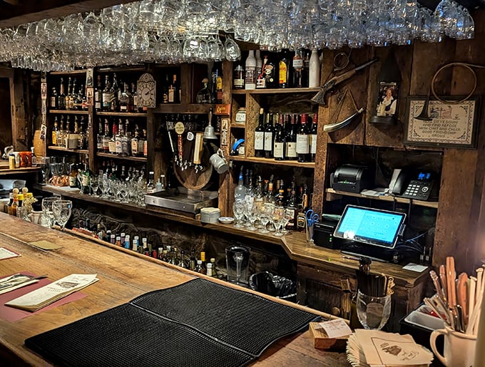 The bar doesn't just serve drinks; it serves time travel with a side of craftsmanship that HGTV would envy.