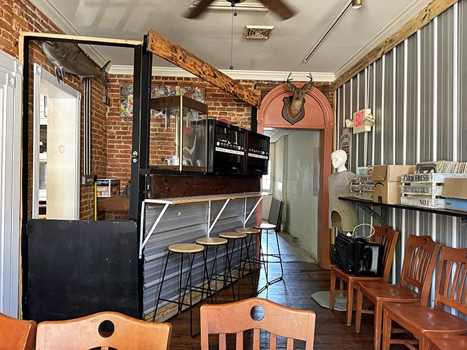Exposed brick meets modern industrial in this cozy bar area where locals gather while waiting for takeout.