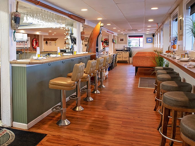 The bar area – where seafood stories are exchanged, local beers flow, and strangers become friends over shared love of butter-dipped goodness.