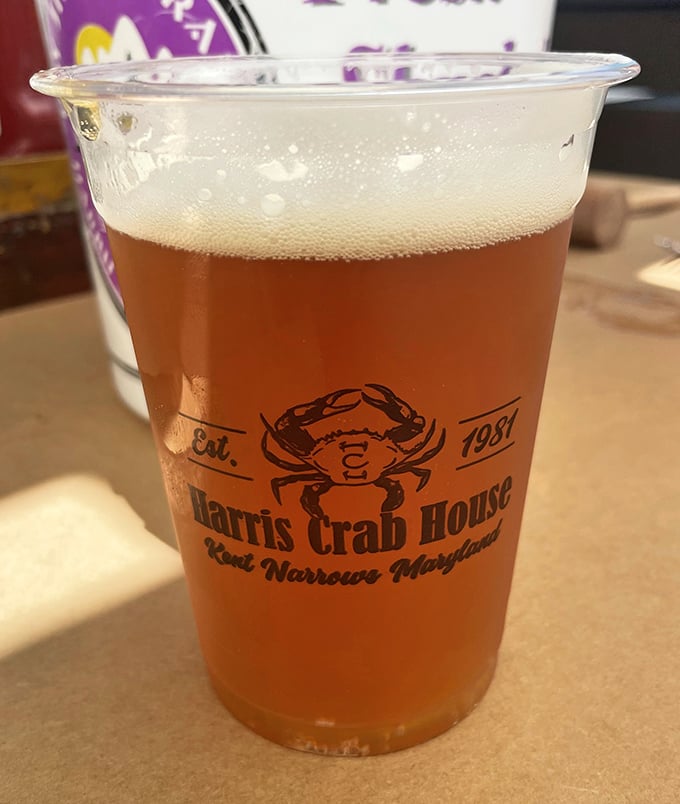 A cold beer in a Harris Crab House cup—because cracking crabs is thirsty work. The perfect partnership since seafood and suds first met.