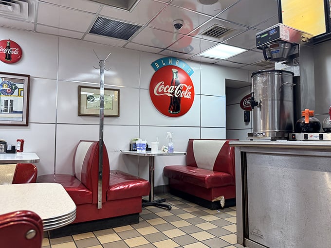 Classic diner aesthetics with Coca-Cola memorabilia—because some decorating styles never go out of fashion for good reason.