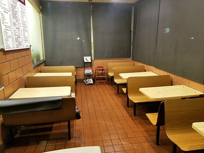 The dining room's no-nonsense booths say, "We know why you're here, and it isn't for the ambiance." Focus on the food, friend.
