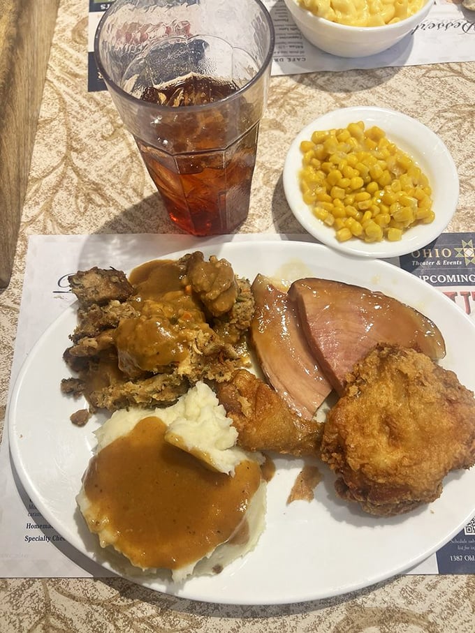 The buffet plate that dreams are made of—fried chicken, roast beef, mashed potatoes, and corn. Amish cooking doesn't believe in small portions or bland flavors.
