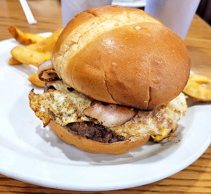 Sometimes the best burgers are the messiest ones – this stacked beauty demands both hands.
