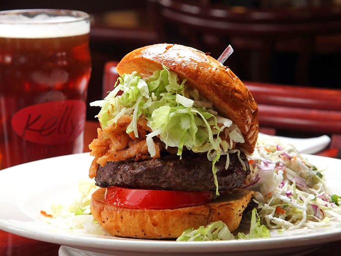 This isn't just a burger—it's a towering achievement of beef, bun, and toppings that requires a game plan before the first magnificent bite.