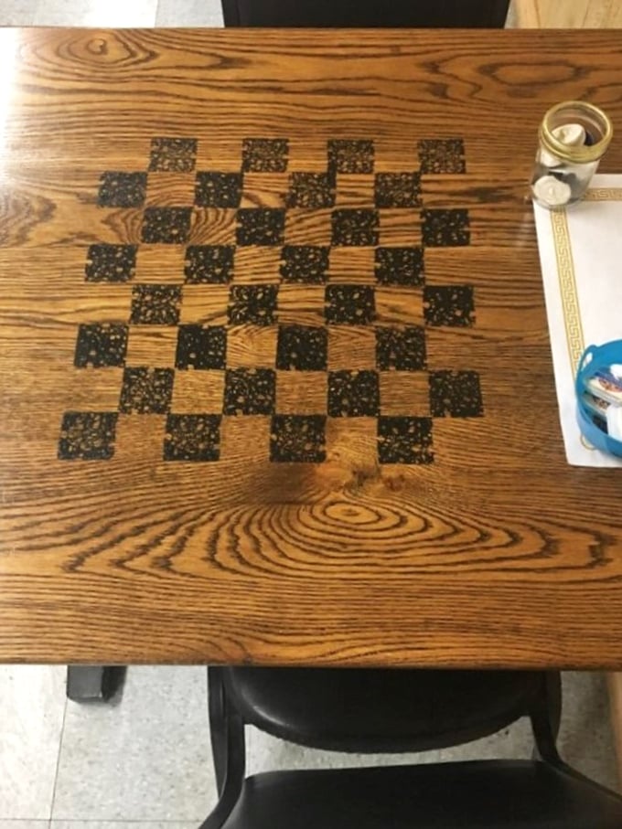 A checkerboard table invites patrons to stay awhile after their meal. In an age of digital distraction, this analog entertainment feels refreshingly rebellious.