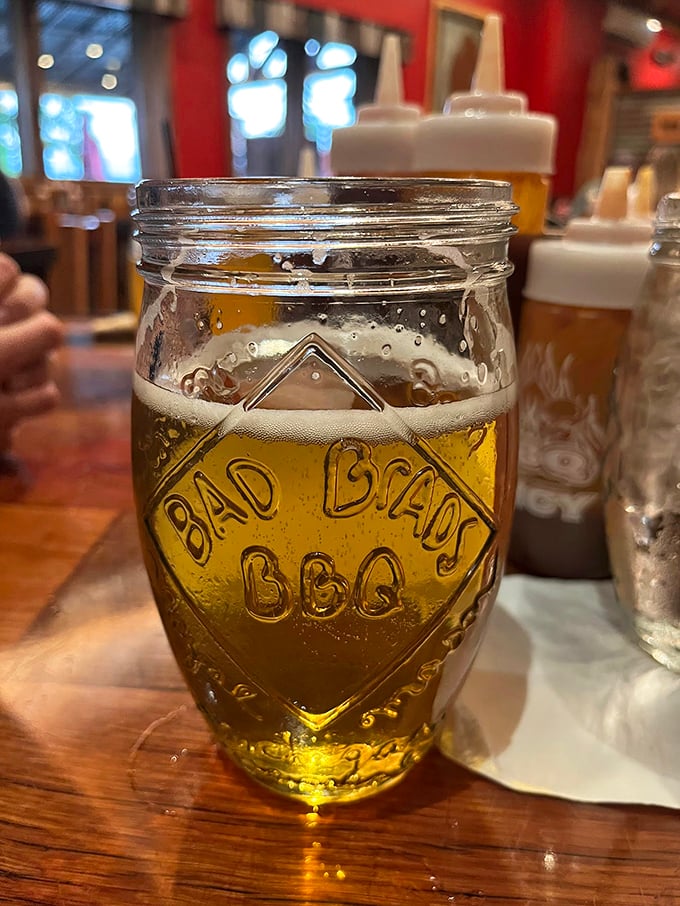 Nothing complements smoky barbecue quite like a cold one served in a mason jar—simple pleasures elevated to art form.