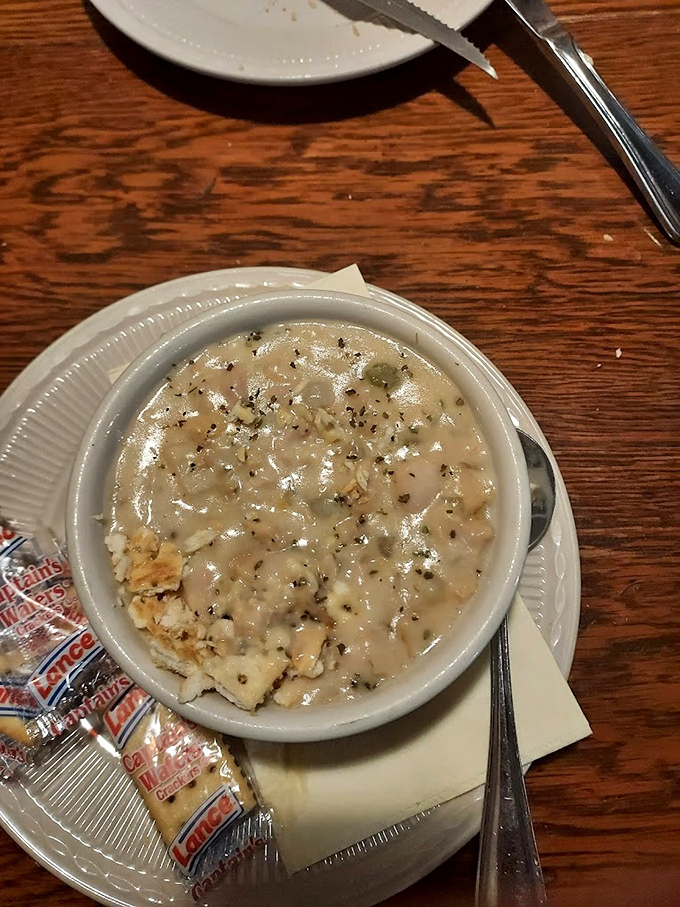 This isn't just clam chowder – it's a creamy bowl of New England tradition that somehow found its perfect home in the Virginia mountains.