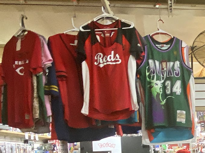 Cincinnati Reds and Celtics jerseys hanging side by side – a sports fan's paradise where team loyalty comes with a bargain price tag.