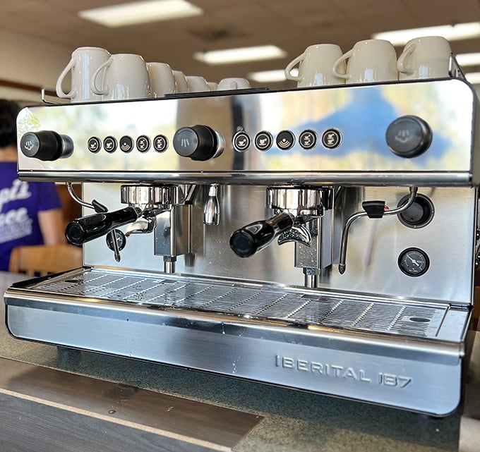 The unsung hero of any great diner—a coffee machine ready to fuel conversations, power through crosswords, and kickstart mornings.