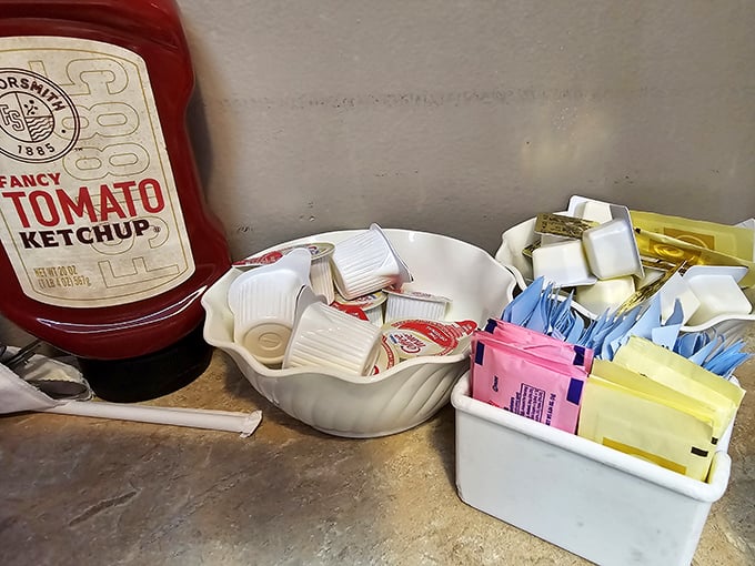 The condiment corner – humble necessities that transform good food into great food. That shell-shaped butter dish is giving serious 1970s dinner party vibes.