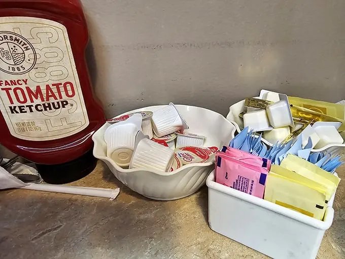 The condiment corner – humble necessities that transform good food into great food. That shell-shaped butter dish is giving serious 1970s dinner party vibes.