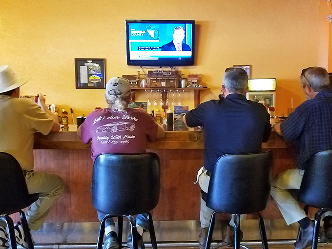 The counter seating – where regulars perch like oracles of breakfast wisdom, sharing local news and debating the merits of crispy versus chewy bacon.