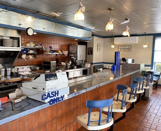 The blue counter stools – where strangers become friends over coffee and where breakfast philosophies are exchanged daily.