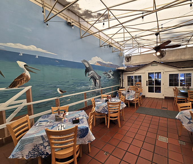 The covered patio where locals gather like it's their personal clubhouse with better food.