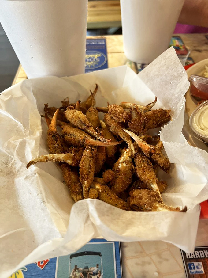 These fried crab claws are the unsung heroes of the seafood world – delicate, sweet morsels that disappear faster than you can say "more please."
