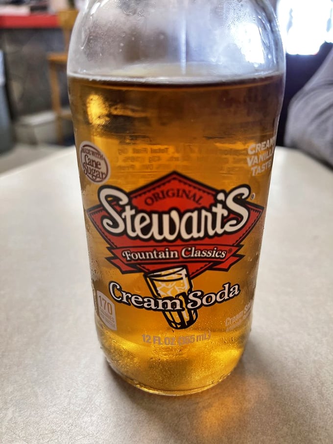 Nothing complements old-school pizza like an ice-cold Stewart's Cream Soda—a pairing so perfect it makes wine and cheese seem like amateurs.
