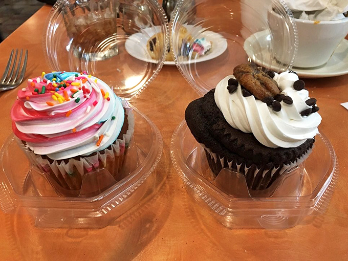 Cupcakes in their natural habitat—plastic containers that can barely contain their frosted exuberance. Happiness, now available in two flavors.