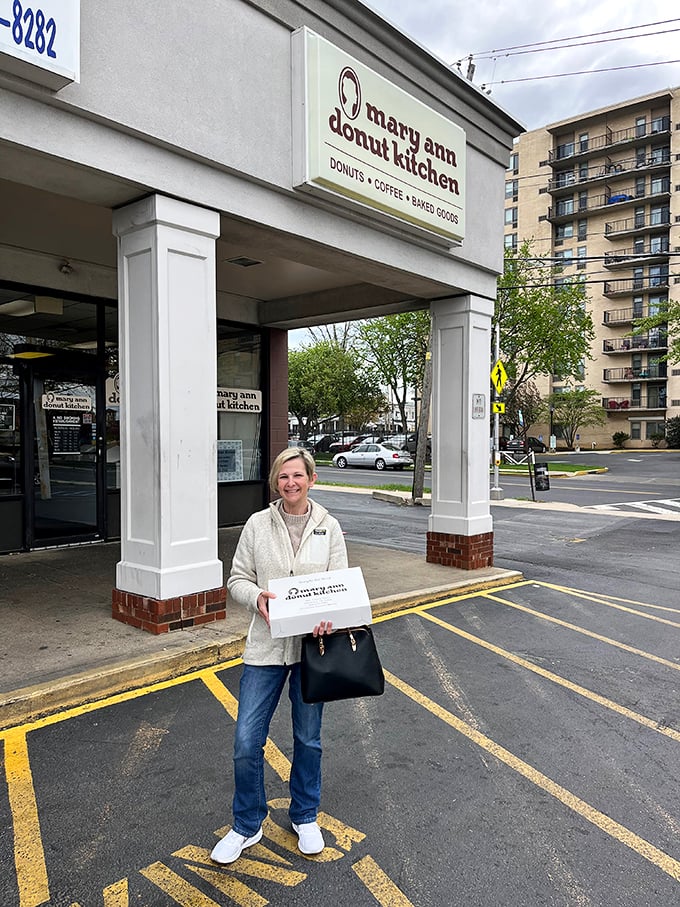 Happy customers leaving with white boxes of joy. The universal language of "I'm bringing treats" that makes you instantly popular.