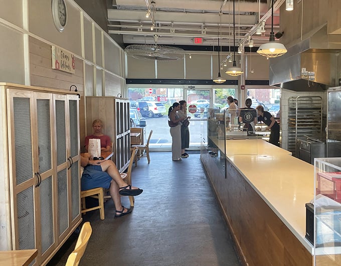 A glimpse into donut democracy—where business suits and weekend casuals stand in the same line, united by the pursuit of fried perfection.
