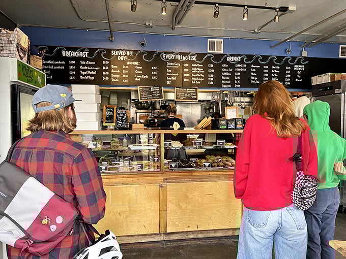 The morning queue forms with purpose—strangers united by the universal language of "I need that biscuit sandwich in my life."