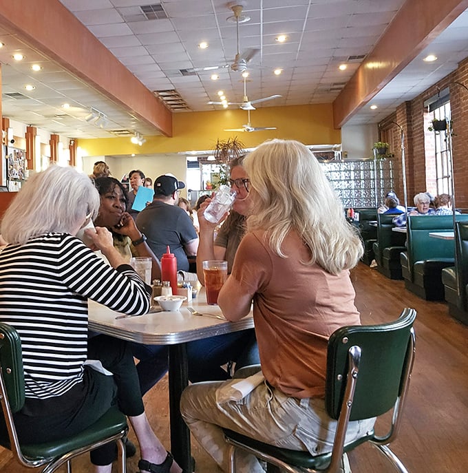 The true measure of a great diner isn't just the food—it's the community that gathers there, sharing stories over bottomless coffee cups.