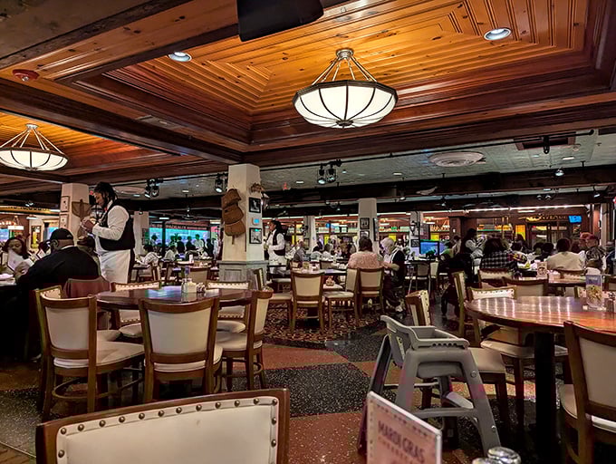 A bustling dining room where memories are made between bites. The wooden ceiling beams have witnessed countless "you've got to try this" moments.
