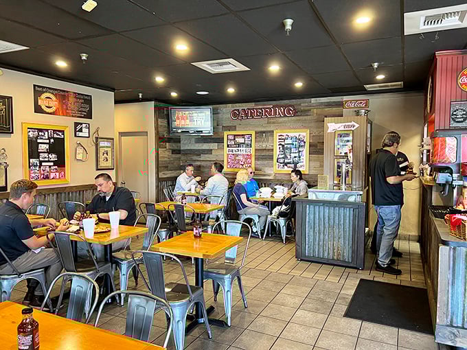 The universal language of barbecue brings strangers together at communal tables. Notice the absence of conversation—everyone's too busy eating.