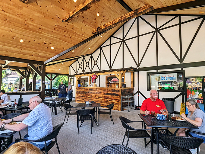 The covered patio offers Bavarian timber-frame views of Helen's charming streetscape—al fresco dining with architectural eye candy.