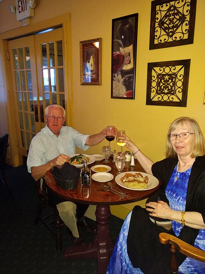 The best Italian meals are shared with good company and good wine. These diners know the secret to happiness is measured in ravioli and Chianti.
