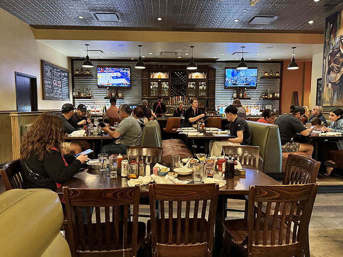 When a restaurant is this packed, it's not just dinner—it's a community event where strangers become friends over shared love of barbecue.