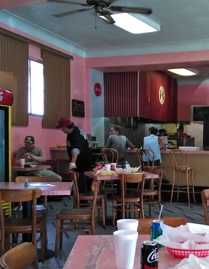 No smartphones in sight, just people living in the moment—enjoying good food in an atmosphere where genuine connection trumps Instagram opportunities.