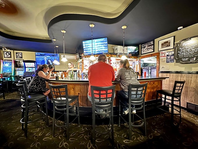 The bar at Frankie's—where strangers become friends and friends become family. Every stool tells a story of good drinks and better conversation.