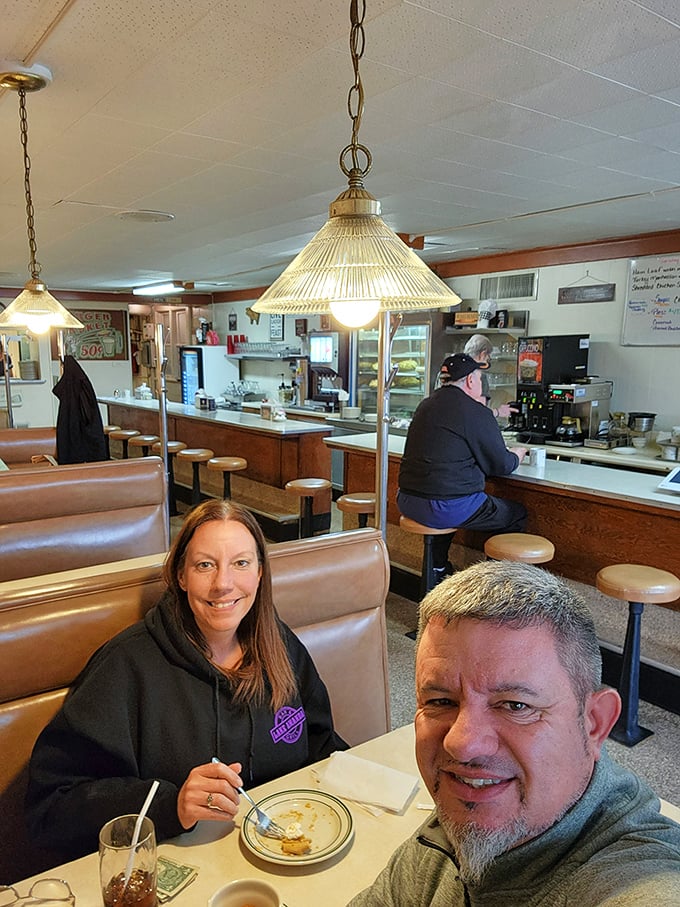 Where locals gather for more than just food—the counter at Bud's serves up community alongside bottomless cups of diner coffee.