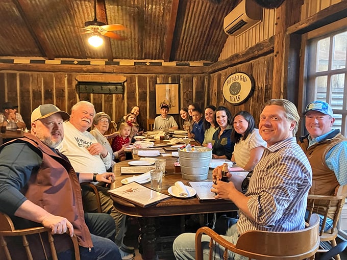 Happy diners gathered around a table laden with Texas-sized portions – this is what food memories are made of.