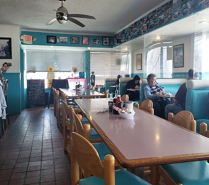 Those counter seats aren't just functional—they're front-row tickets to the best show in town: breakfast served all day with a side of local gossip.
