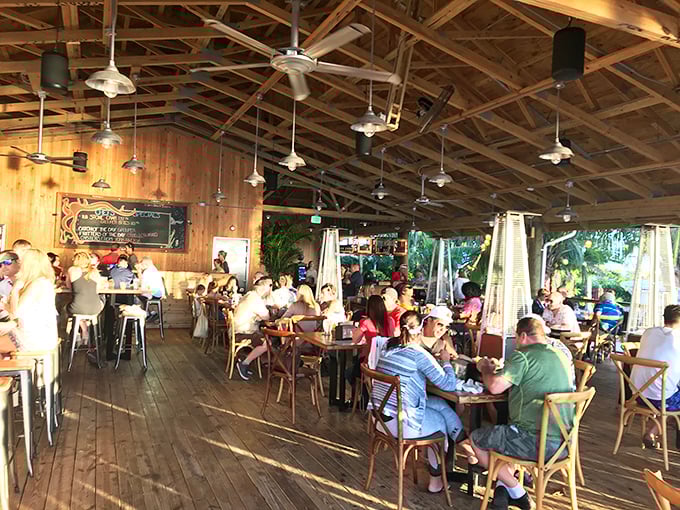 The true Florida dining experience isn't about white tablecloths—it's about wooden tables, ceiling fans, and the sound of laughter mixing with sea breeze.
