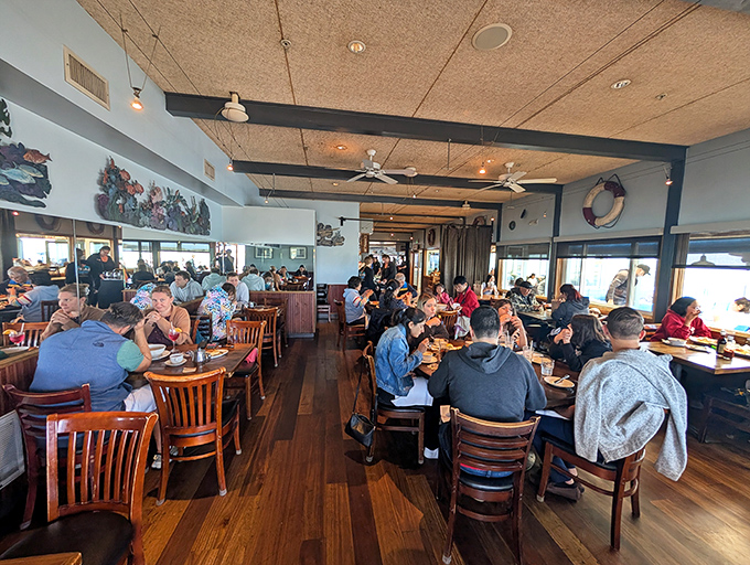 A full house of happy diners—the universal sign of good food. That buzz of conversation is the soundtrack to memorable meals.