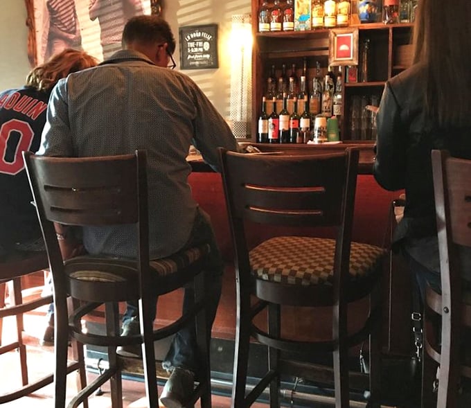 Local sports fans and food enthusiasts alike find common ground at Momocho's bar, where tequila bridges all cultural divides.