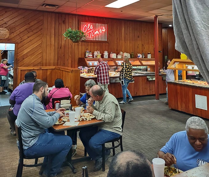 The true measure of a buffet's success: diners too focused on their plates to notice they're being photographed in their natural habitat.