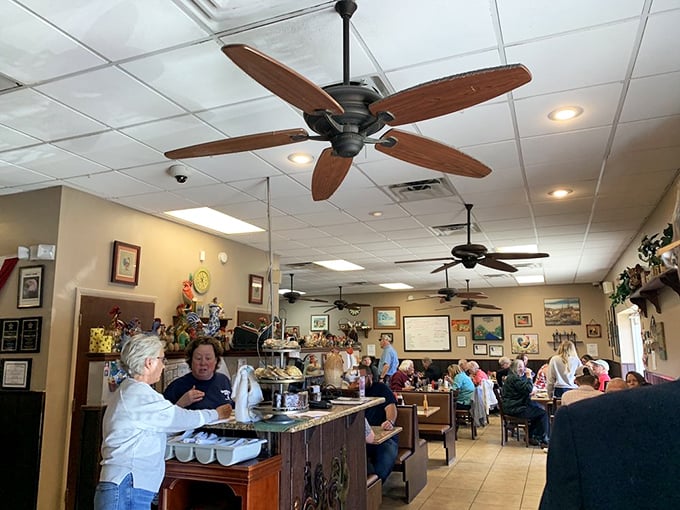 Where locals gather to solve world problems over eggs and coffee. The ceiling fans keep the conversations as fresh as the food.