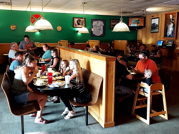 Families gathered around tables, sharing slices and conversation—the universal language of "this pizza is too good to talk about until we finish eating."