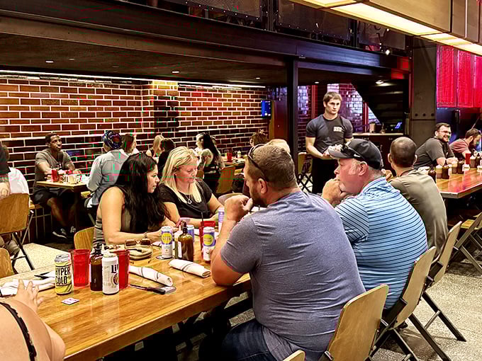 At Mabel's, BBQ isn't just a meal—it's a social event. These tables have heard more food moans than a bakery at sunrise.