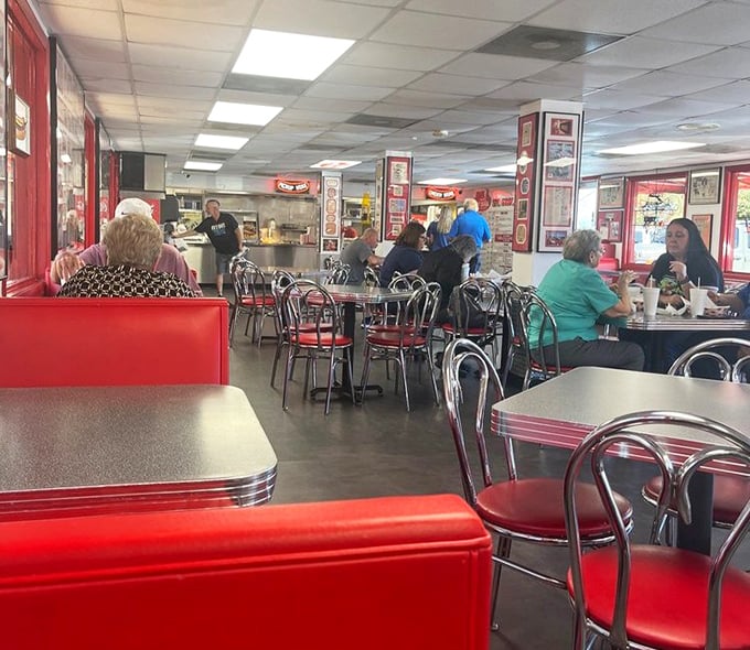 Lunchtime at Mel's brings together a cross-section of Tampa – from business suits to beach attire, united by the universal language of excellent hot dogs.